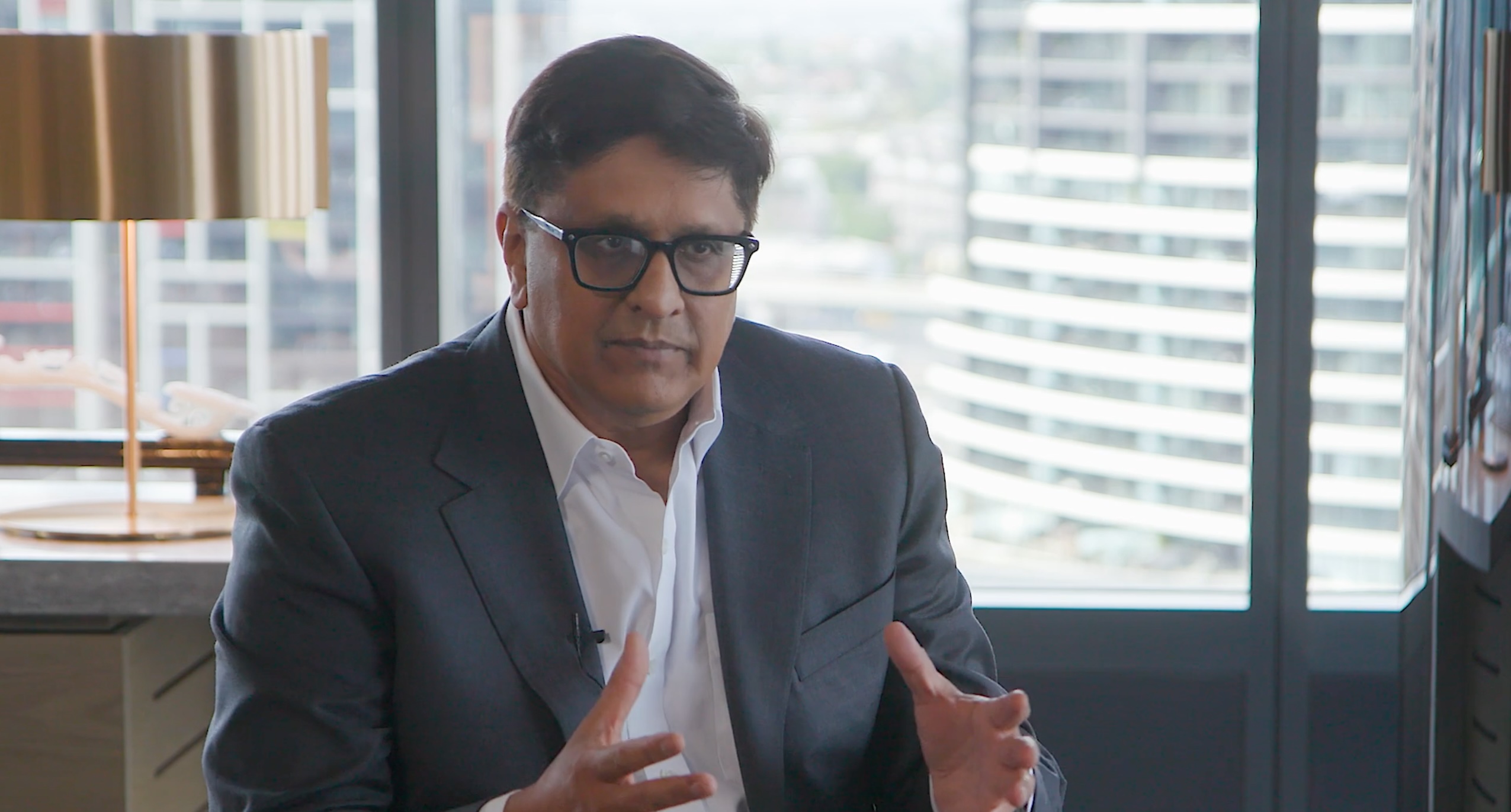 ANZ Chief Financial Officer Farhan Faruqui speaks with Brett Foley ...